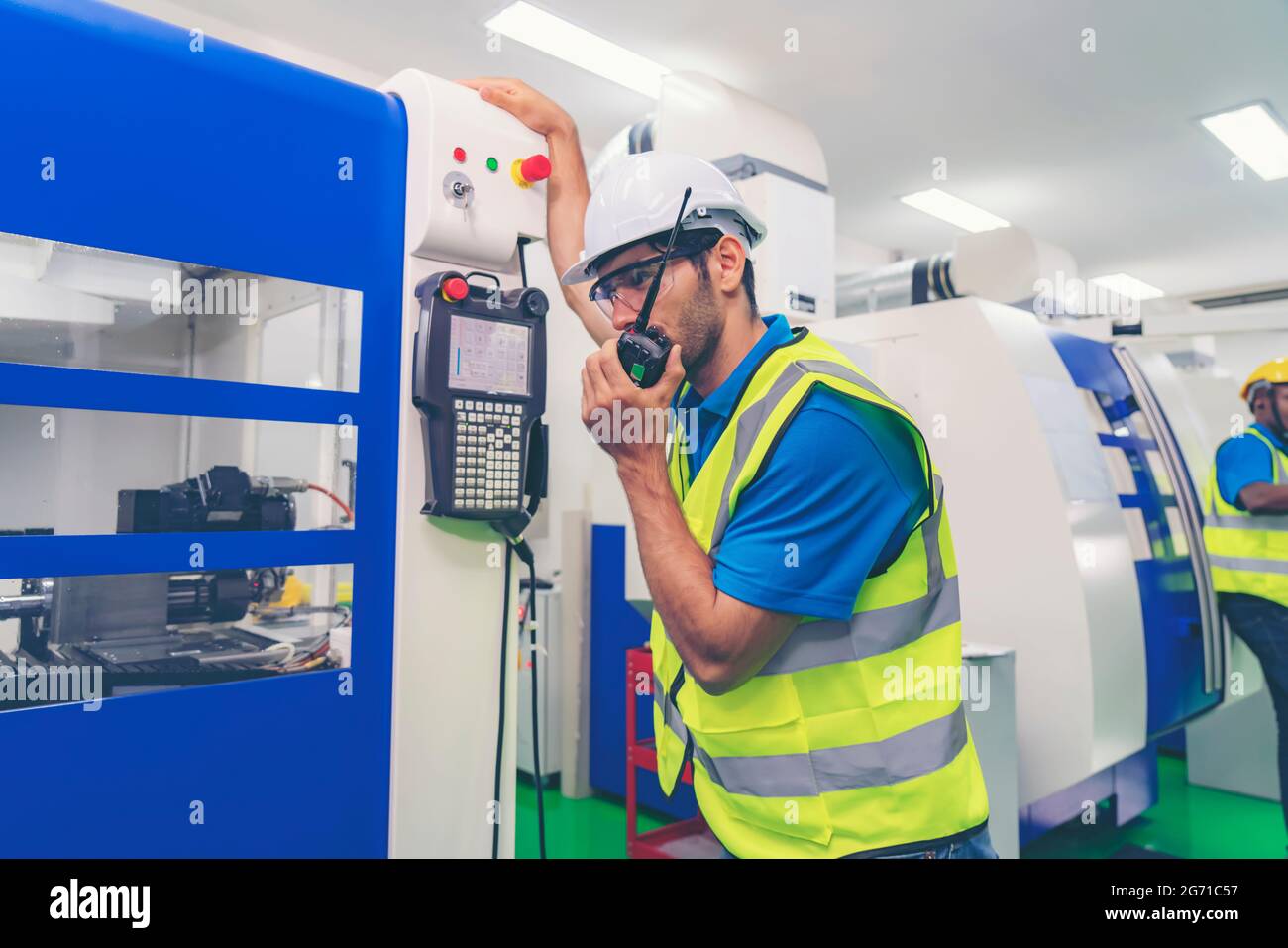 Male industrial engineer or technician worker wear face mask with ...