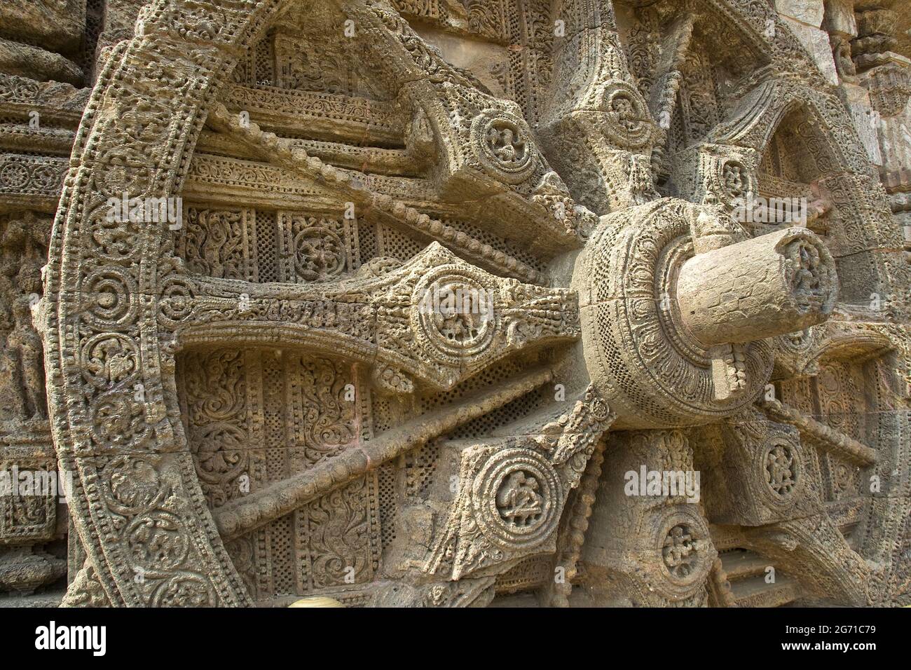 Intricate design of stone wheel, spokes, axle and wedge pin at Sun ...
