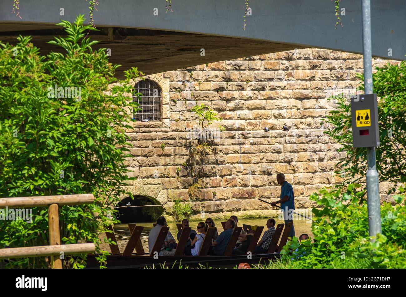 Tübingen, Baden-Württemberg, Germany, Jul 16, 2014: A punting boat full ...