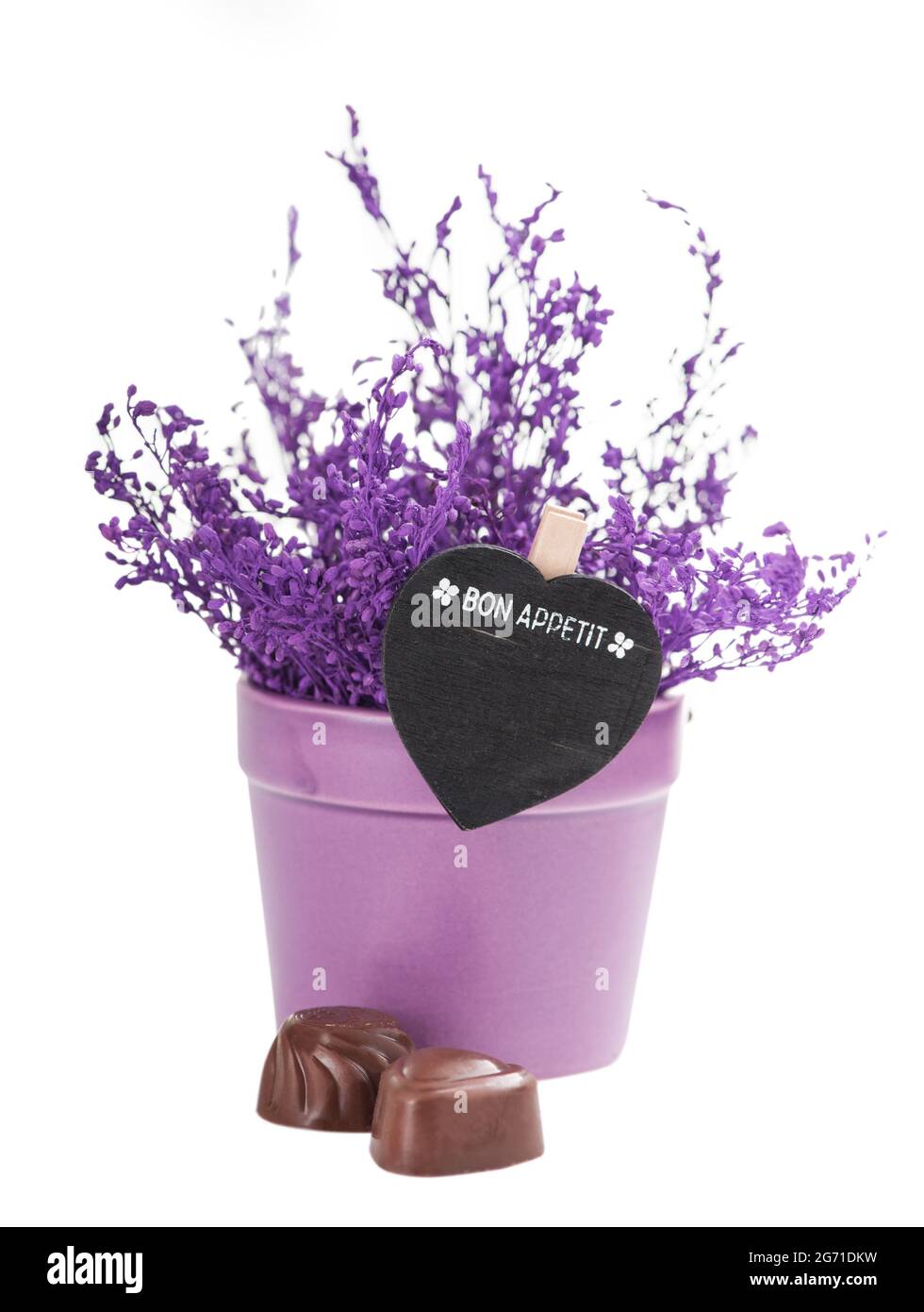 Chocolates and Bon Appetit Sign with purple pot flower (Eng. Good ...