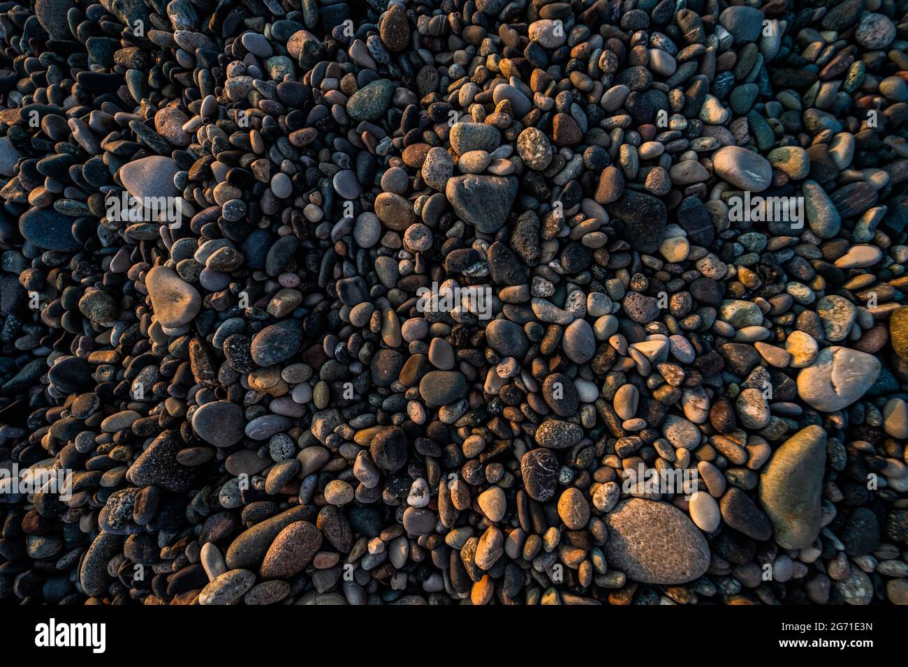 Beach sea stones as a natural textured background Stock Photo - Alamy