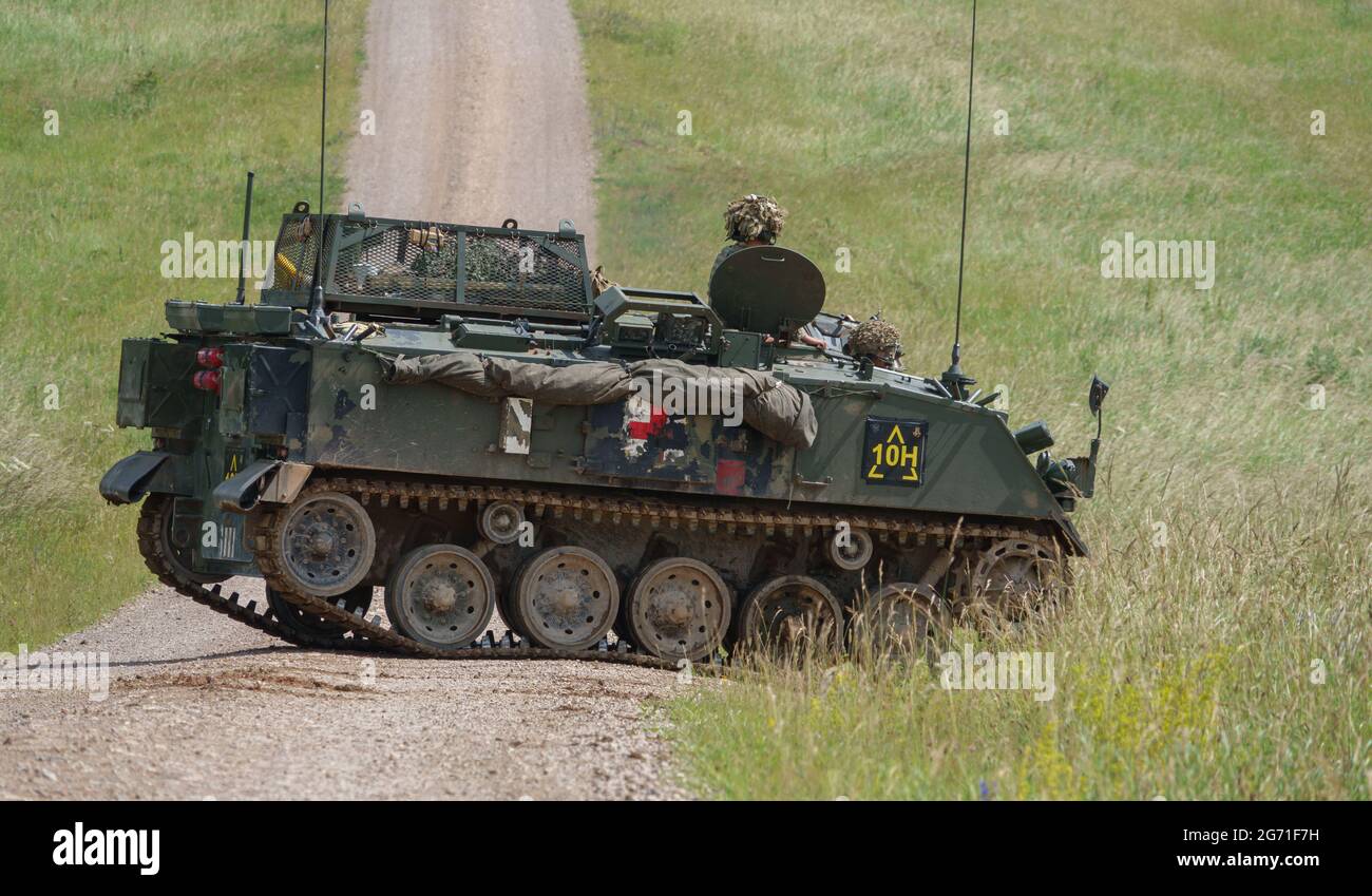 British army FV432 Bulldog armored personnel carrier in action on a ...