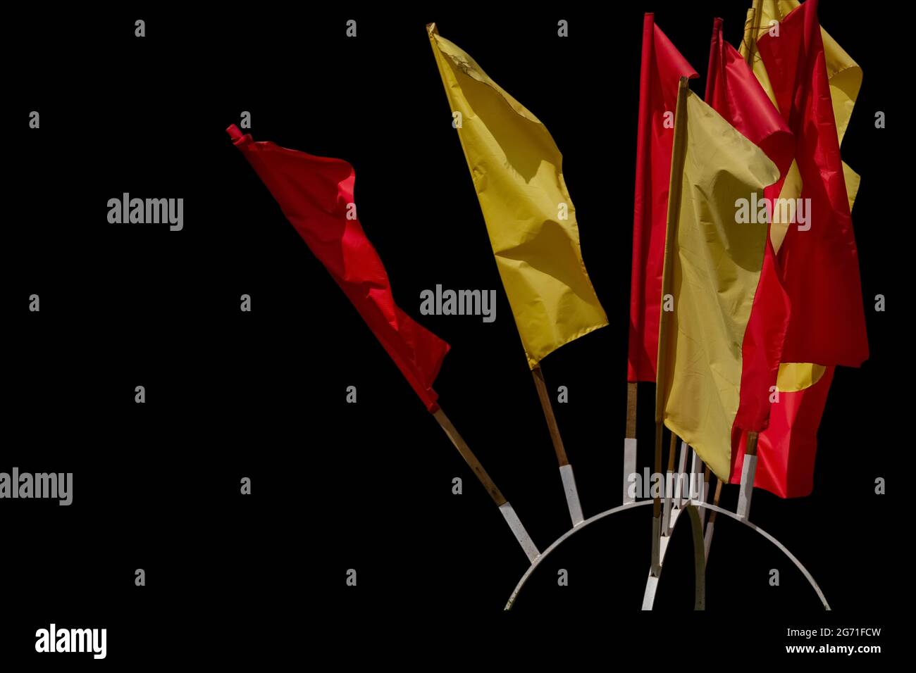 Texture of multi-colored festive red, yellow flags made of fabric ...