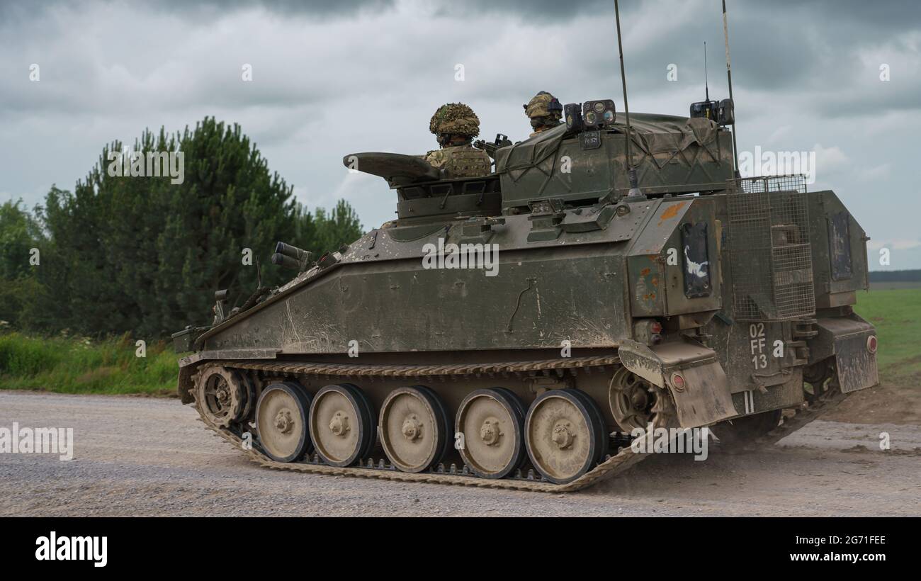 british army FV103 Spartan light armored vehicle in action on a ...