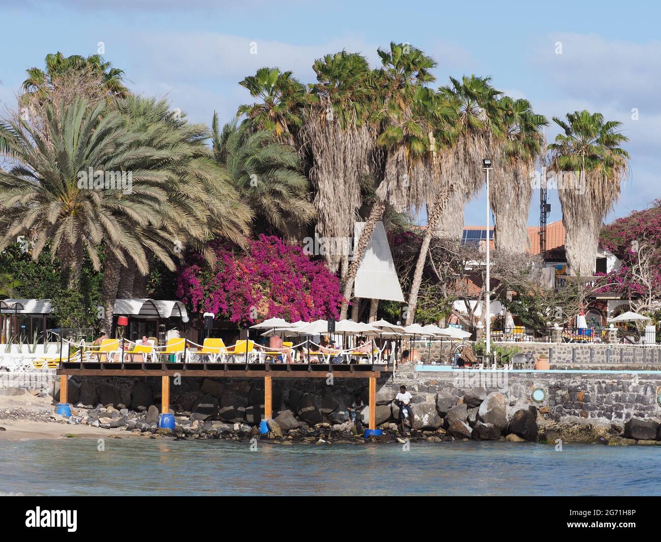 Tropical pier on Atlantic Ocean in african Santa Maria town at Sal ...