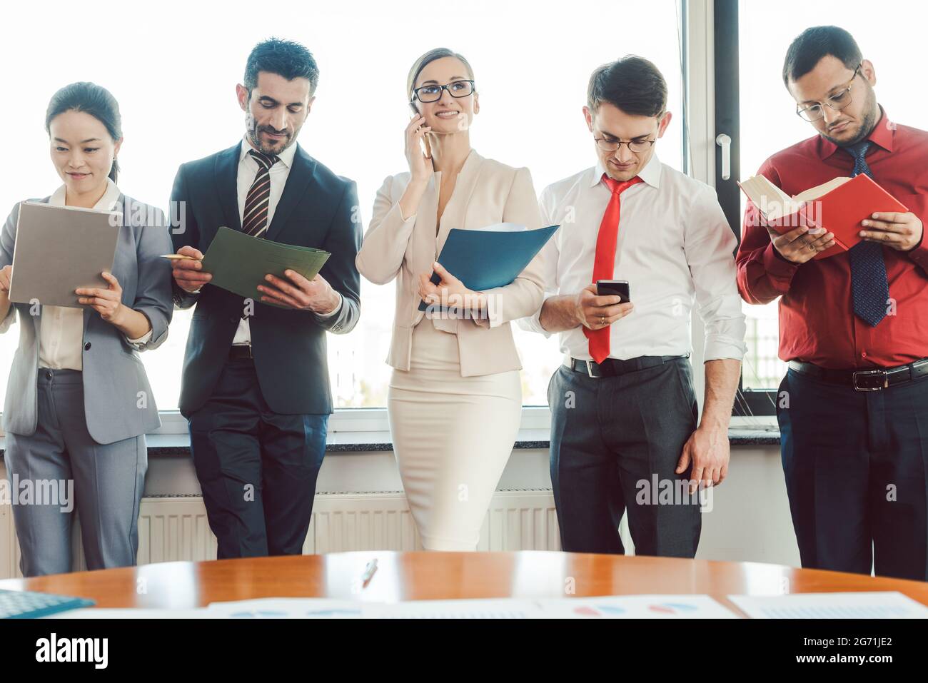 Different workers working together hi-res stock photography and images ...