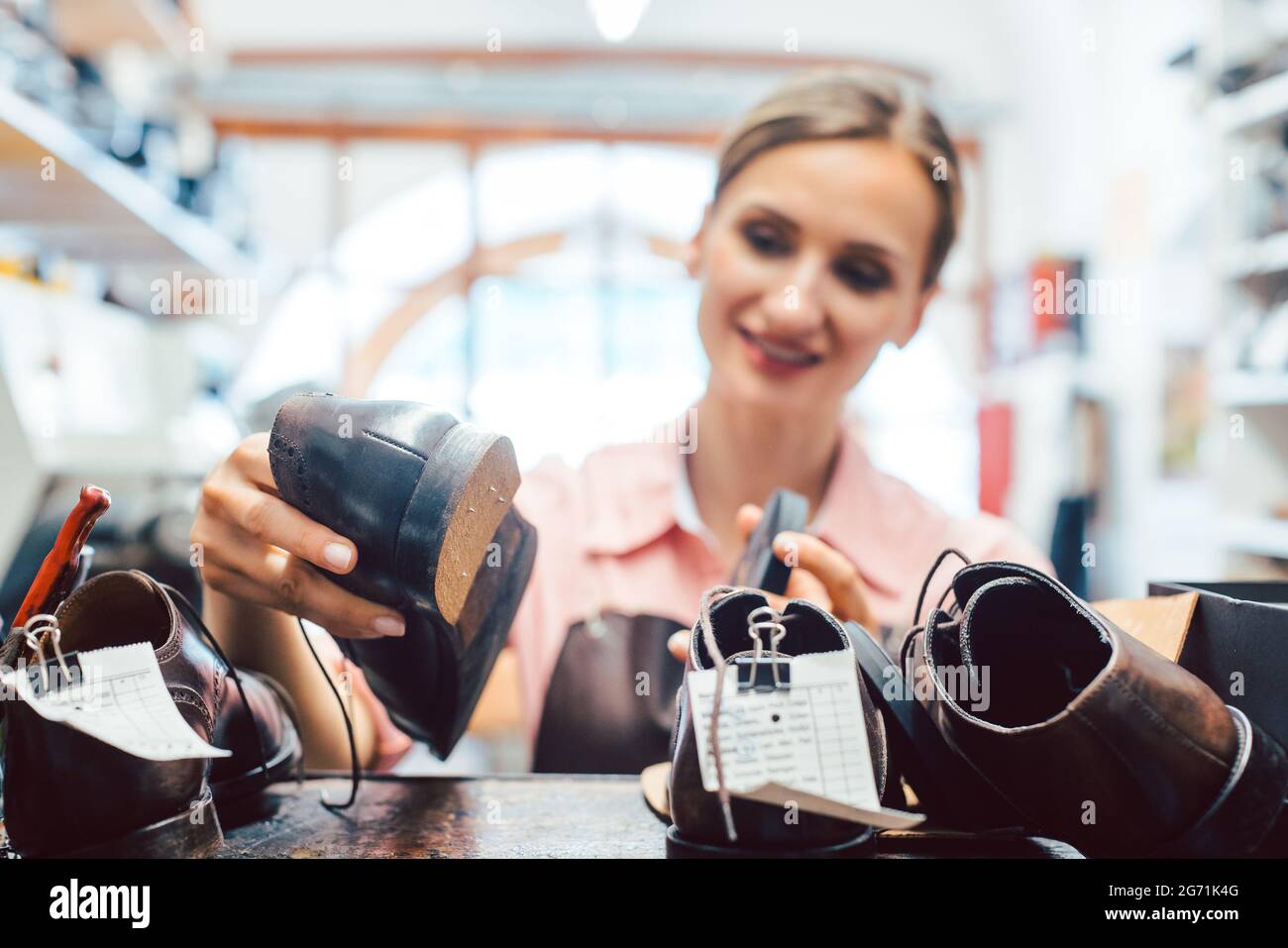Woman taking off shoes hi-res stock photography and images - Alamy