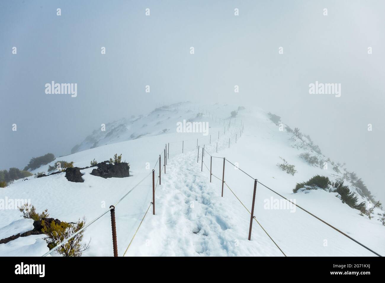Overview of Pico Ruivo footpath covered with snow in Santana, Madeira ...
