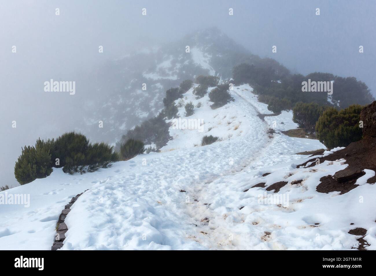 Overview of Pico Ruivo footpath covered with snow in Santana, Madeira ...