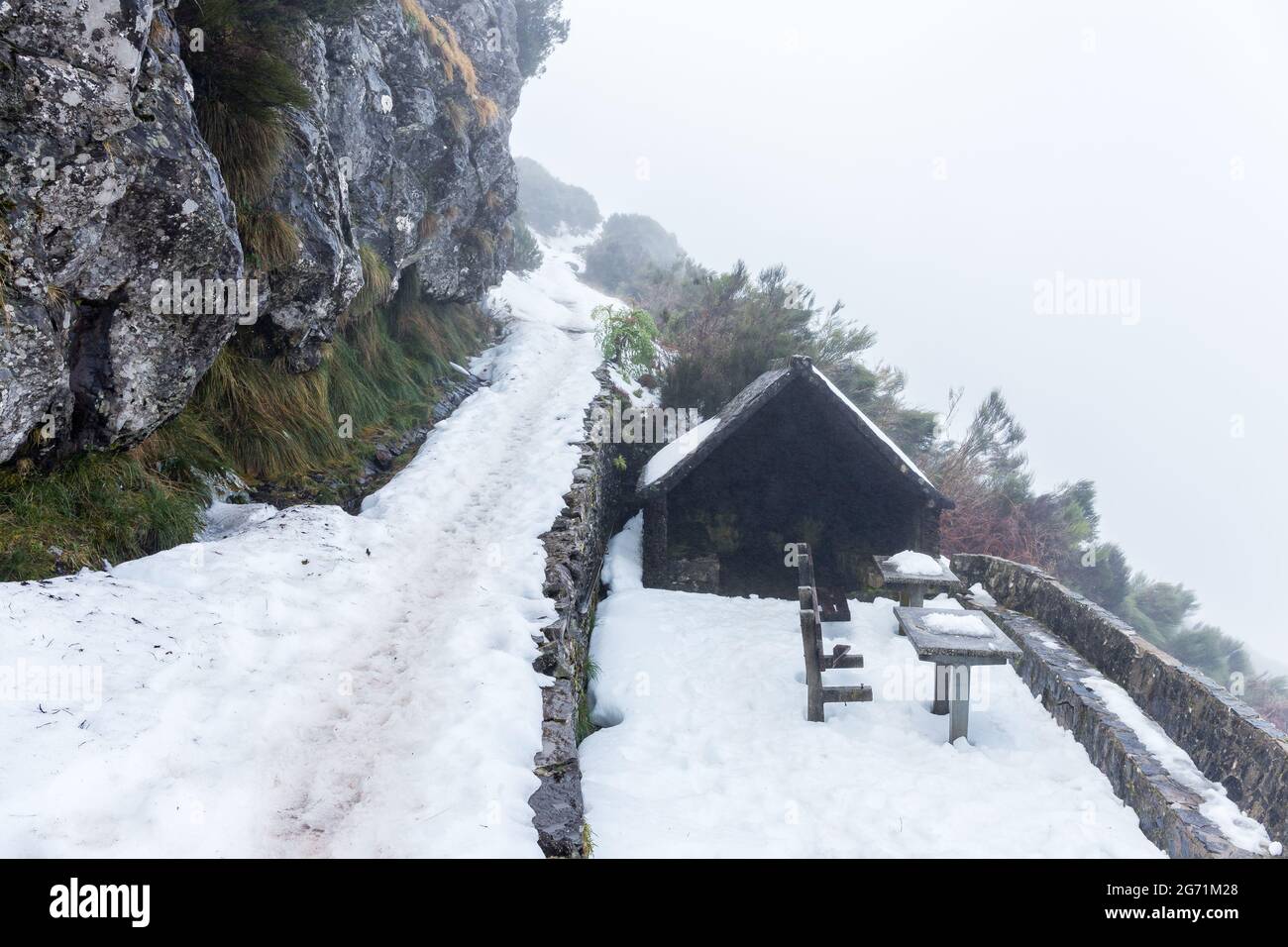 Shelter house covered with snow in Pico Ruivo footpath, Santana ...