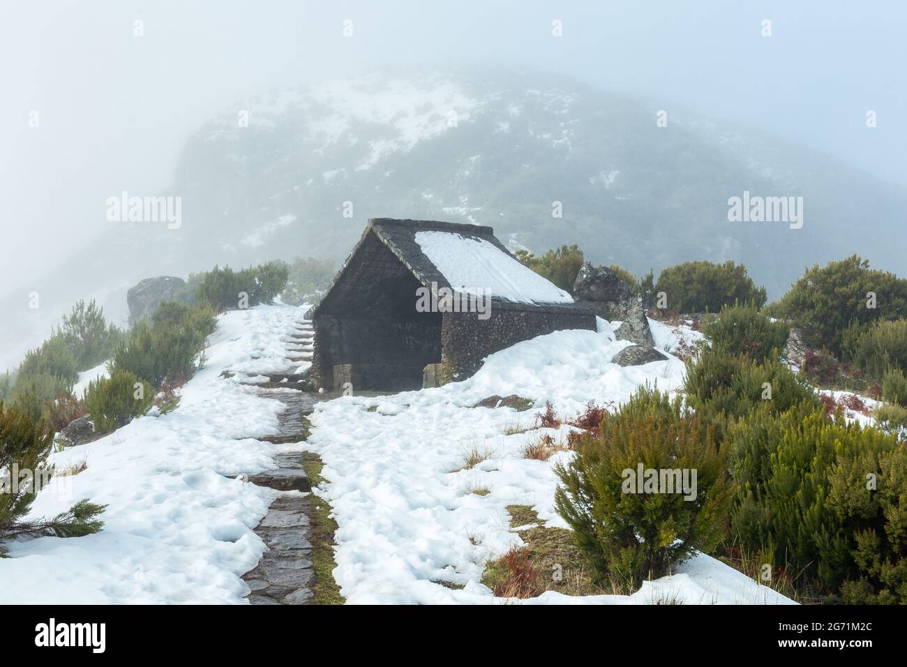Shelter house covered with snow in Pico Ruivo footpath, Santana ...