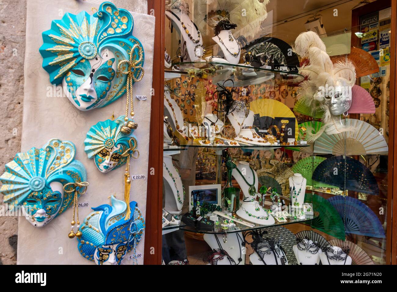 The decorative Venetian face mask originated in Venice , Italy reputed ...
