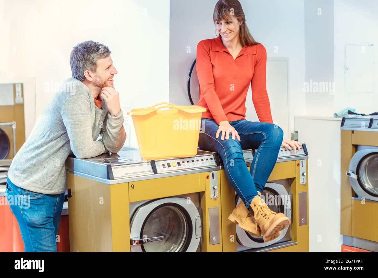 Sitting on the washing machine hi-res stock photography and images - Alamy