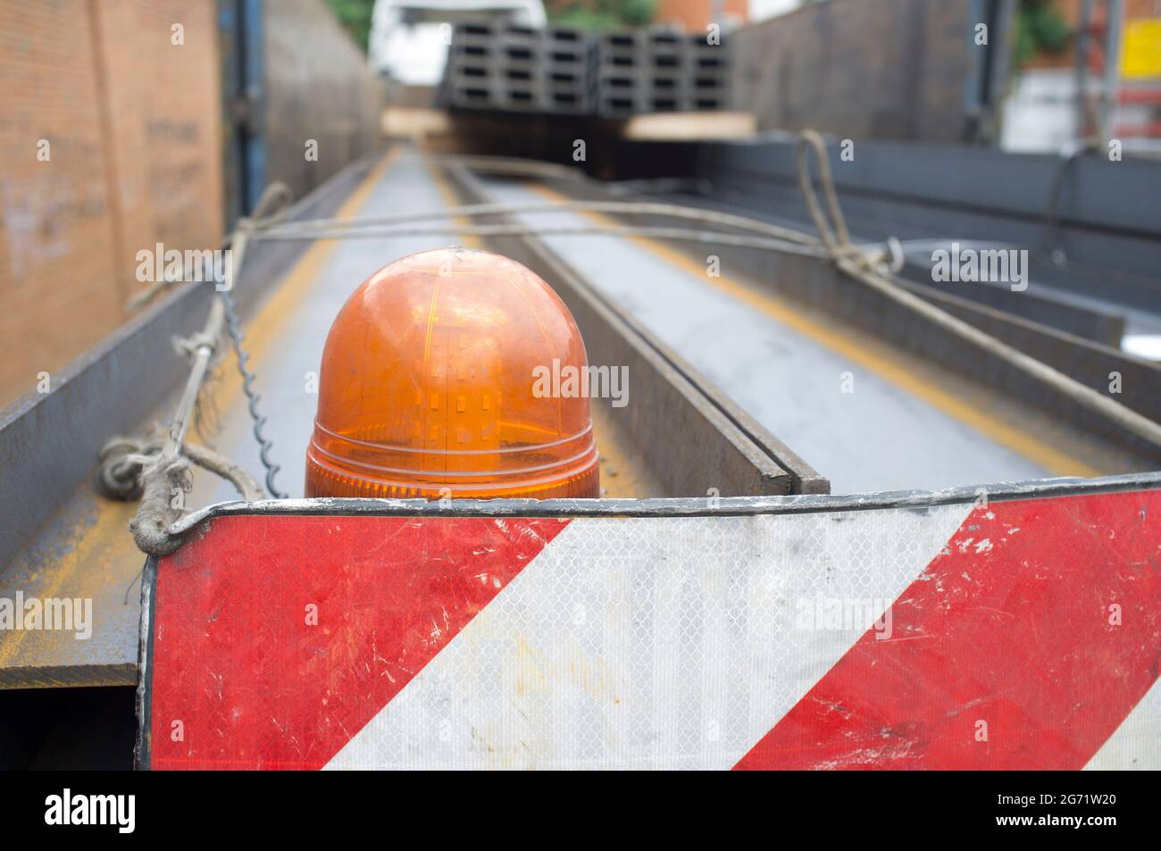 Building materials truck loaded with steel beams. Oversize load length ...