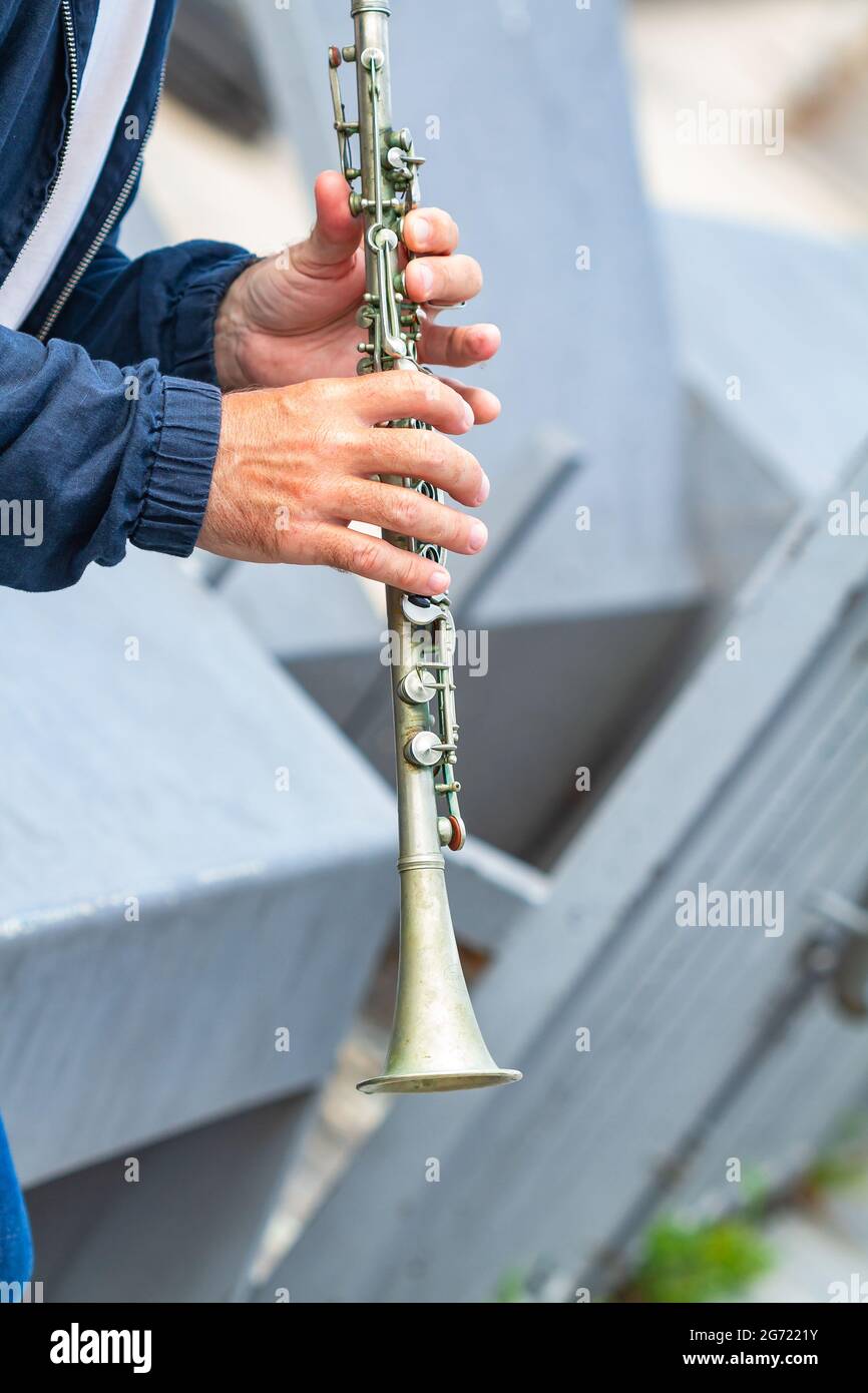 Holding clarinet hi-res stock photography and images - Alamy
