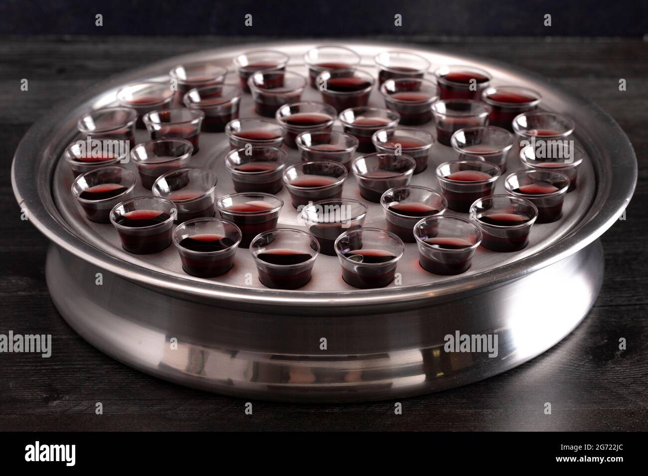 Elements of the Holy Communion or Lords Supper on a Dark Wood Table ...