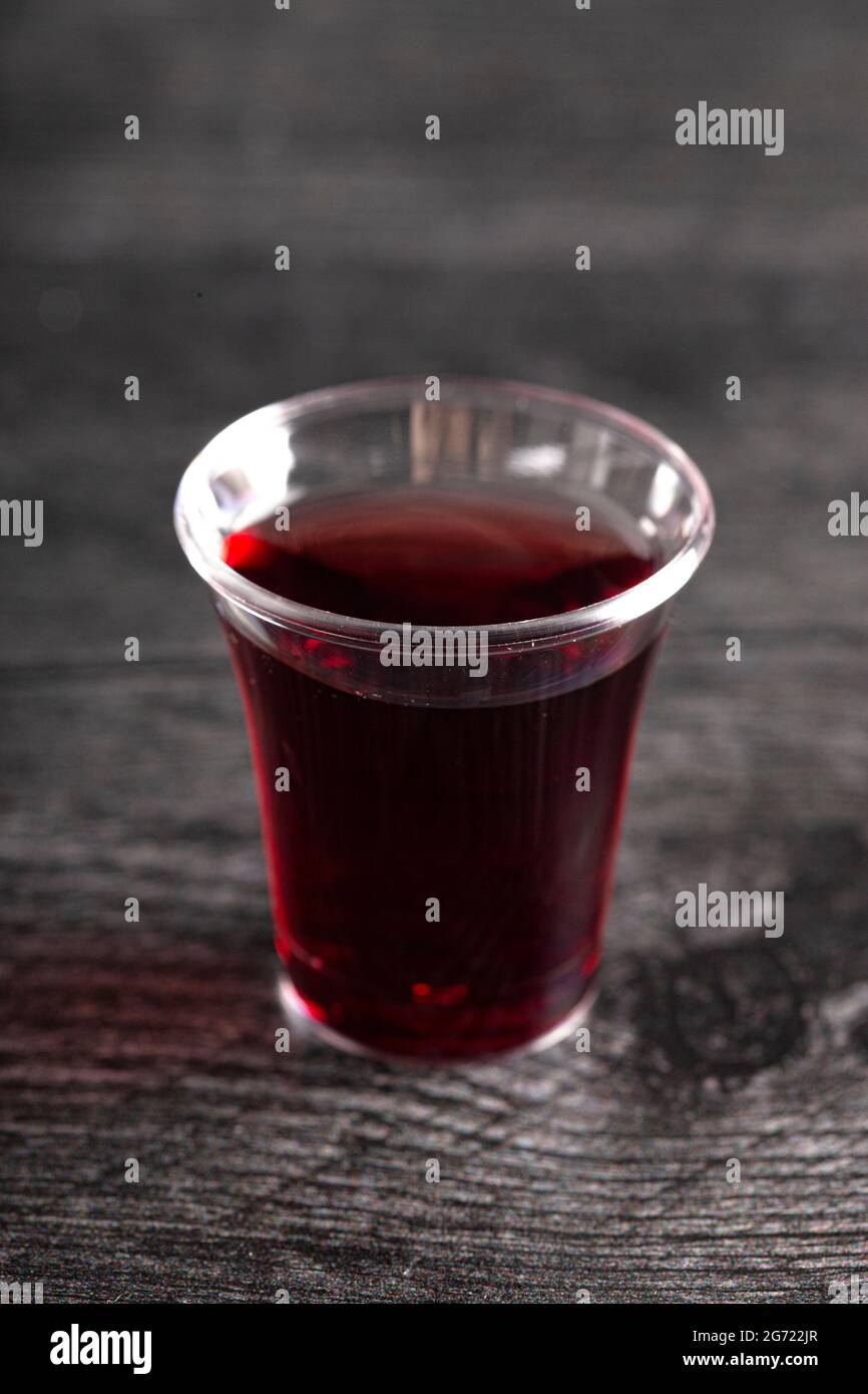 Elements of the Holy Communion or Lords Supper on a Dark Wood Table ...
