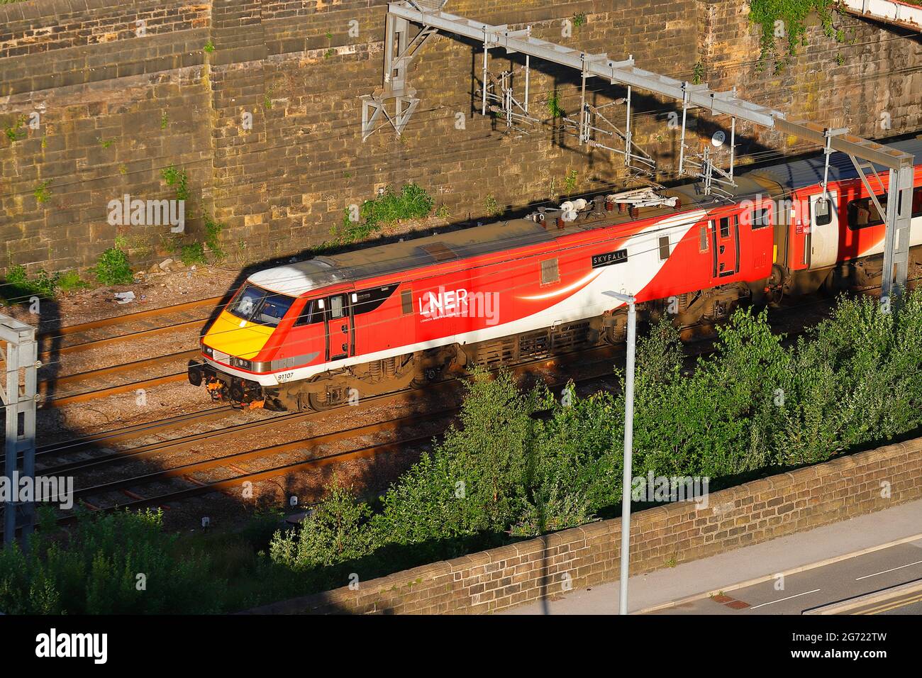 A London North Eastern Railway (LNER) train heading into Leeds through ...