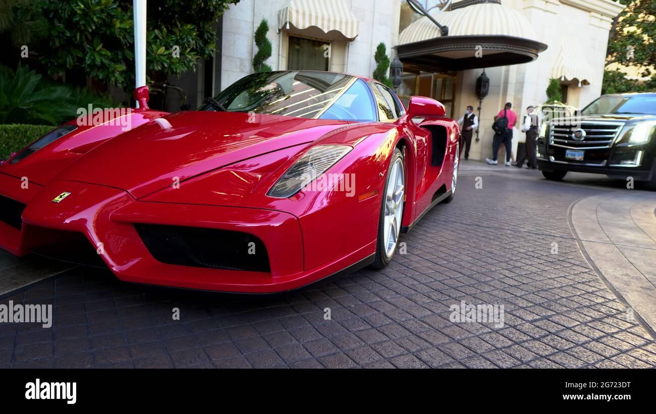 Jun 03, 2021: A couple of luxury cars parked on the pavement in front ...