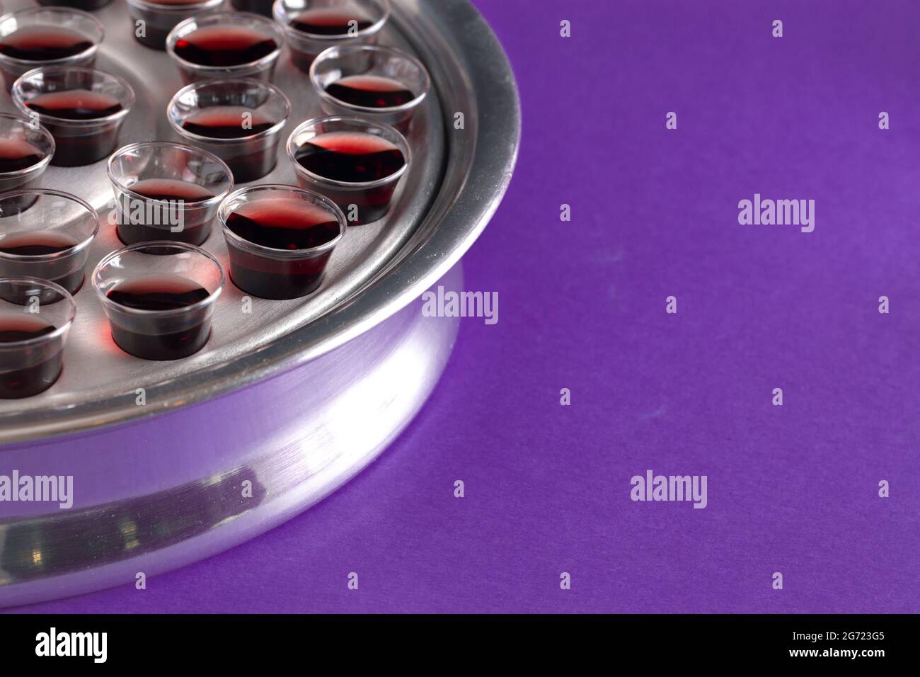 Elements of the Holy Communion or Lords Supper on a Purple Table Stock ...