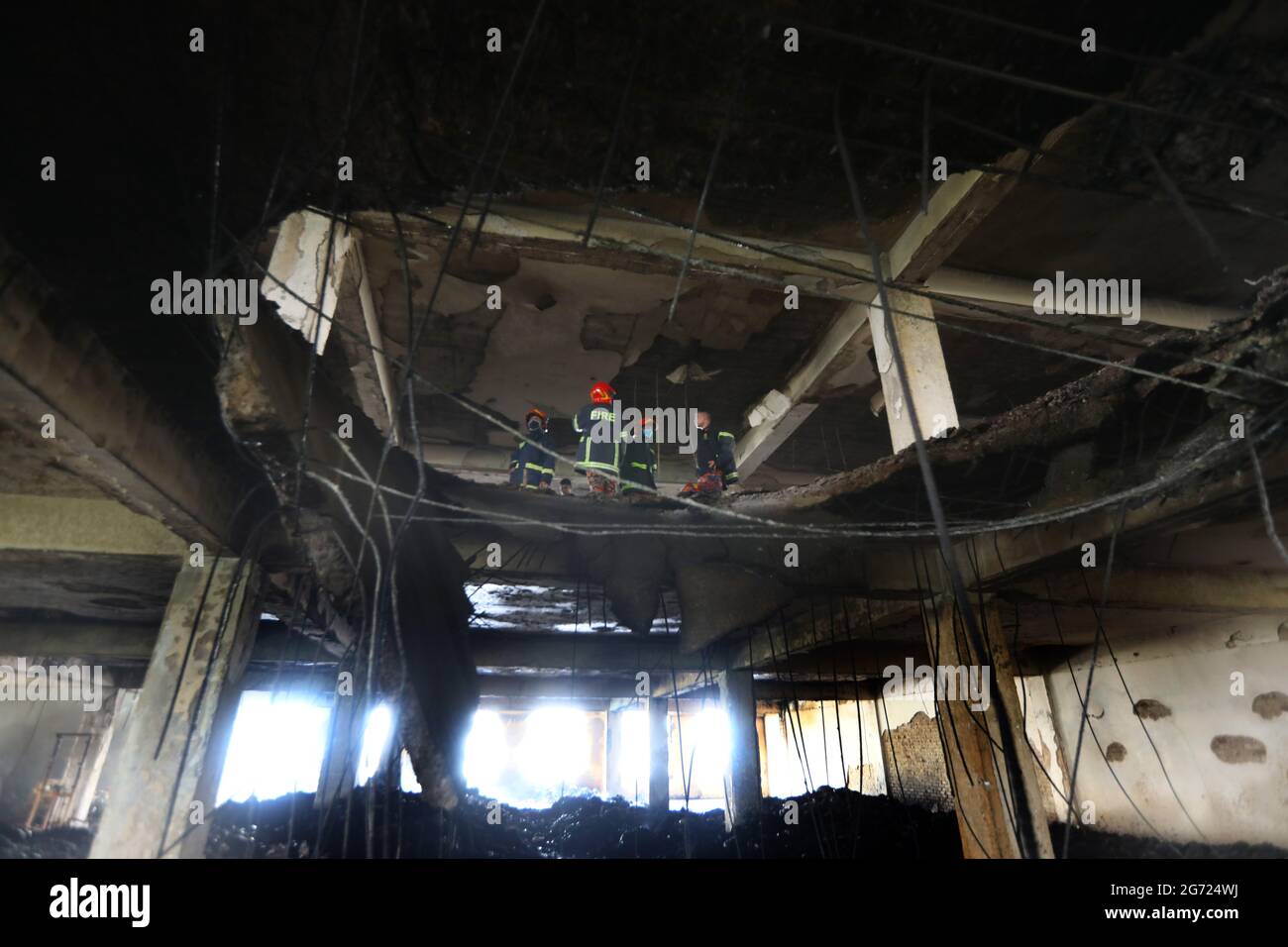 July 10, 2021.Dhaka,Bangladesh: Bangladeshi firefighters remove fire in ...