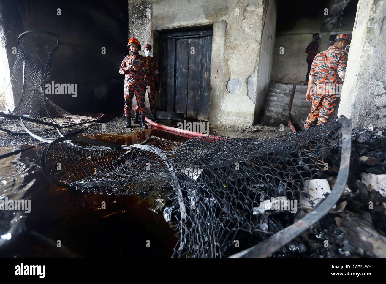 July 10, 2021.Dhaka,Bangladesh: Bangladeshi firefighters remove fire in ...