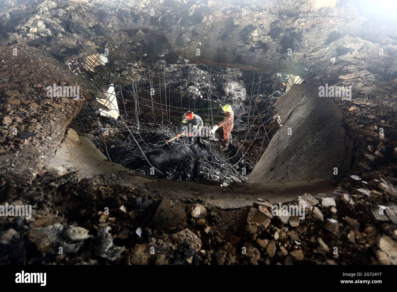July 10, 2021.Dhaka,Bangladesh: Bangladeshi firefighters remove fire in ...
