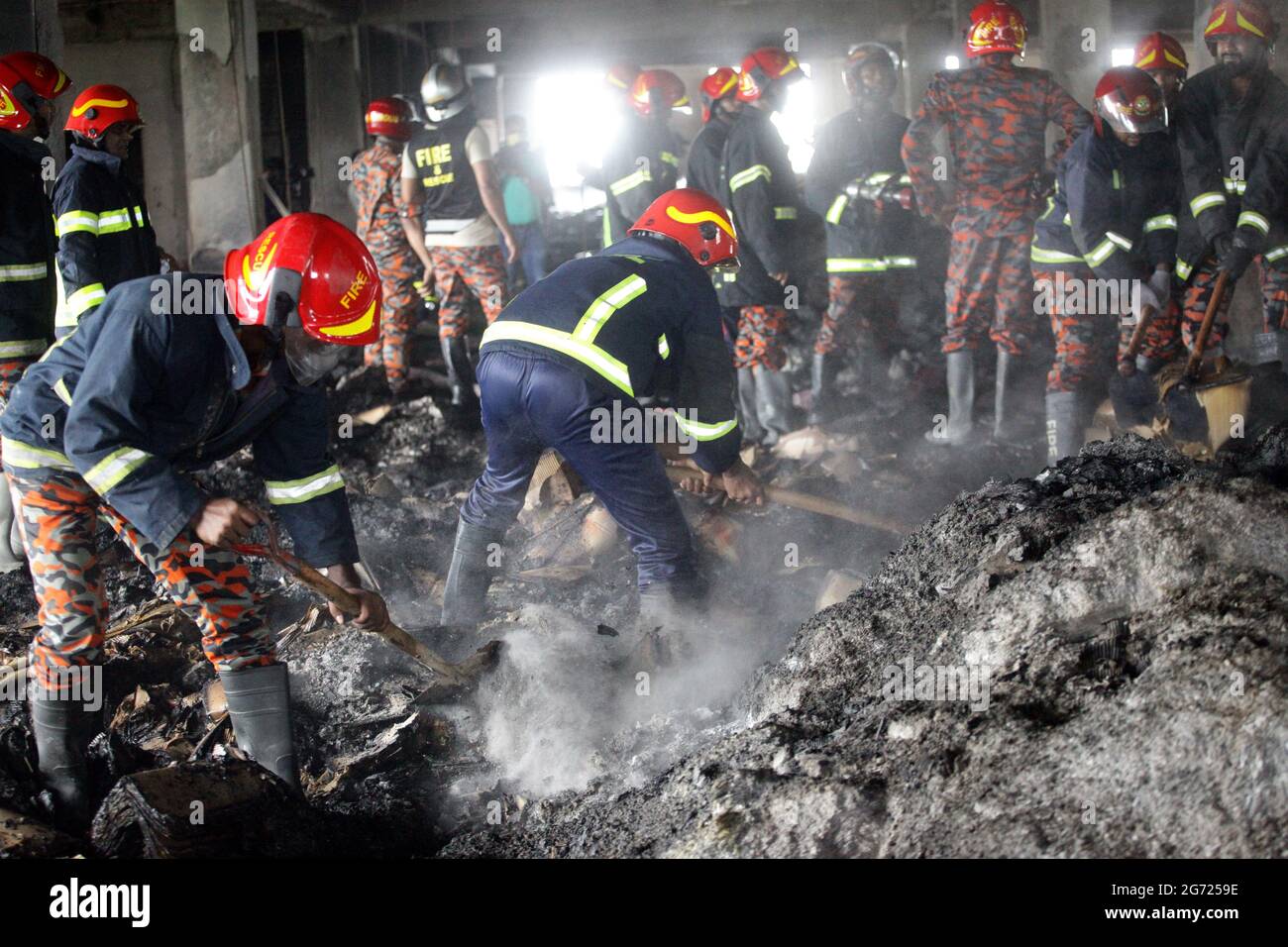 July 10, 2021.Dhaka,Bangladesh: Bangladeshi firefighters remove fire in ...