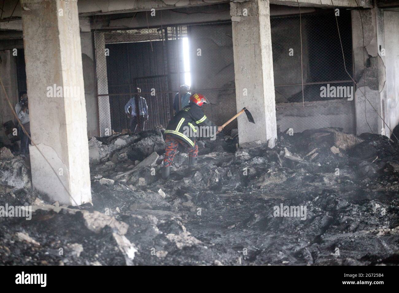 July 10, 2021.Dhaka,Bangladesh: Bangladeshi firefighters remove fire in ...
