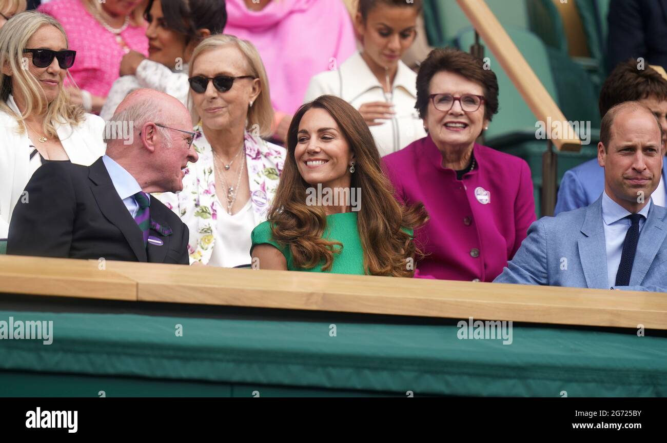 The Duke and Duchess of Cambridge sit next to the Chairman of the All ...
