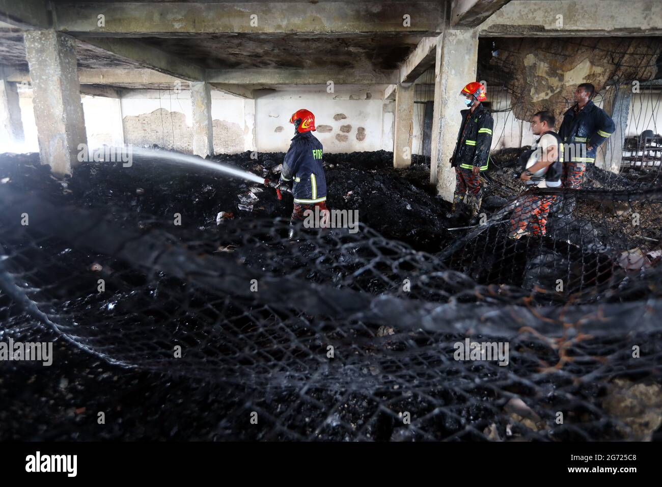 July 10, 2021.Dhaka,Bangladesh: Bangladeshi firefighters remove fire in ...