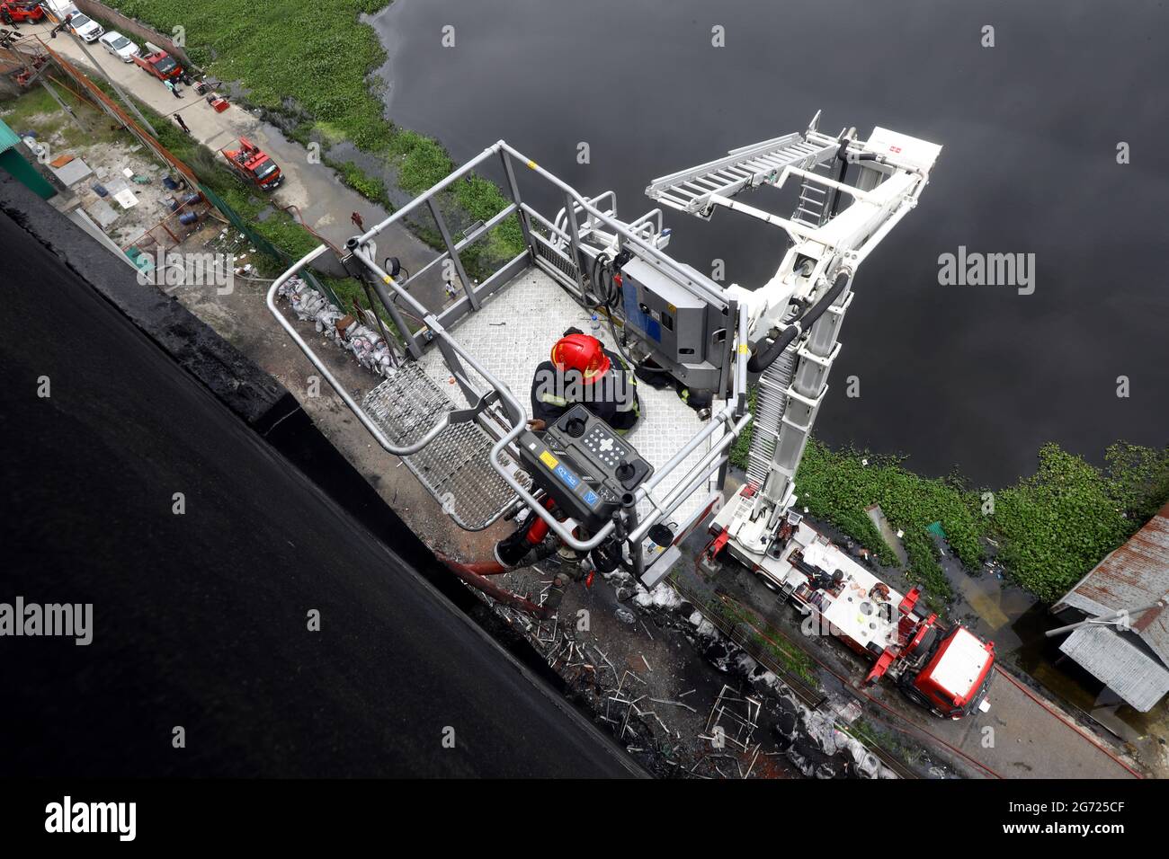 July 10, 2021.Dhaka,Bangladesh: Bangladeshi firefighters remove fire in ...