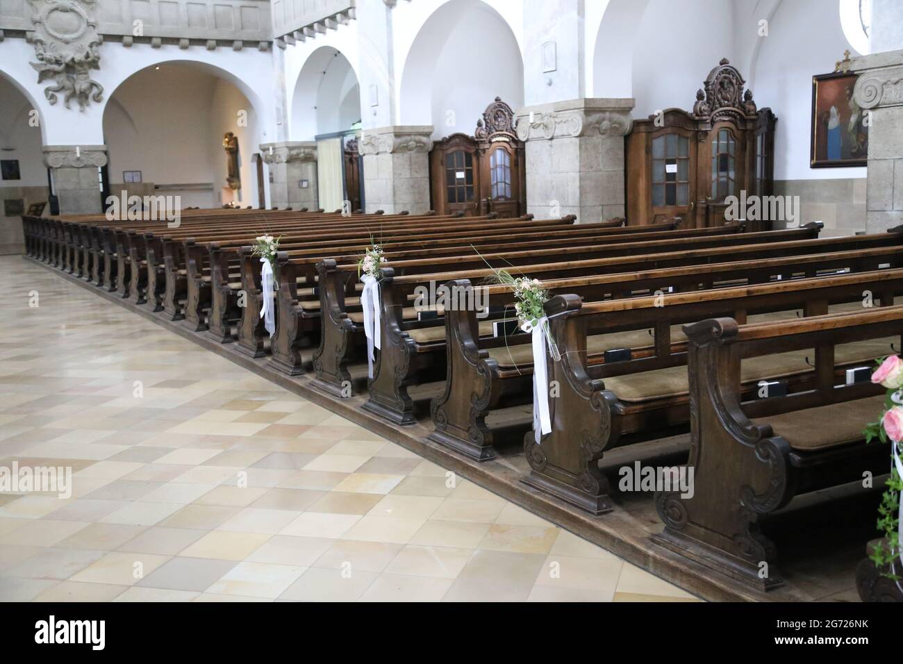 Empty church with wooden benches Stock Photo - Alamy