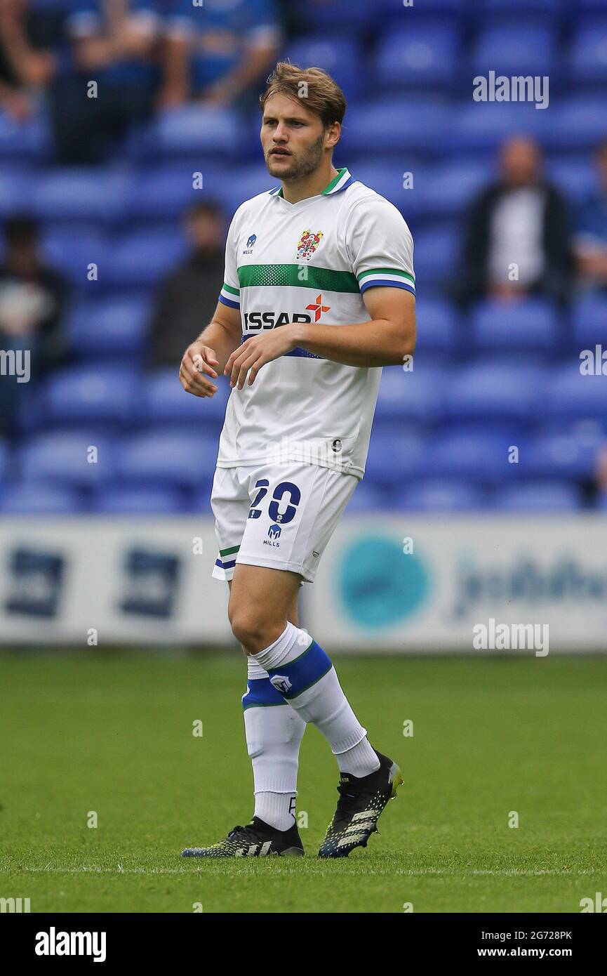 Birkenhead, UK. 10th July, 2021. Elliott Nevitt of Tranmere Rovers ...