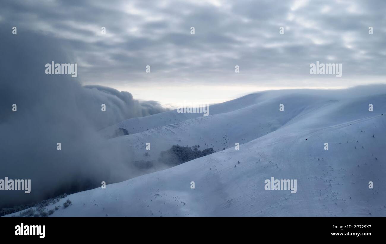 snow storm mountains ski resort natural disaster Stock Photo - Alamy