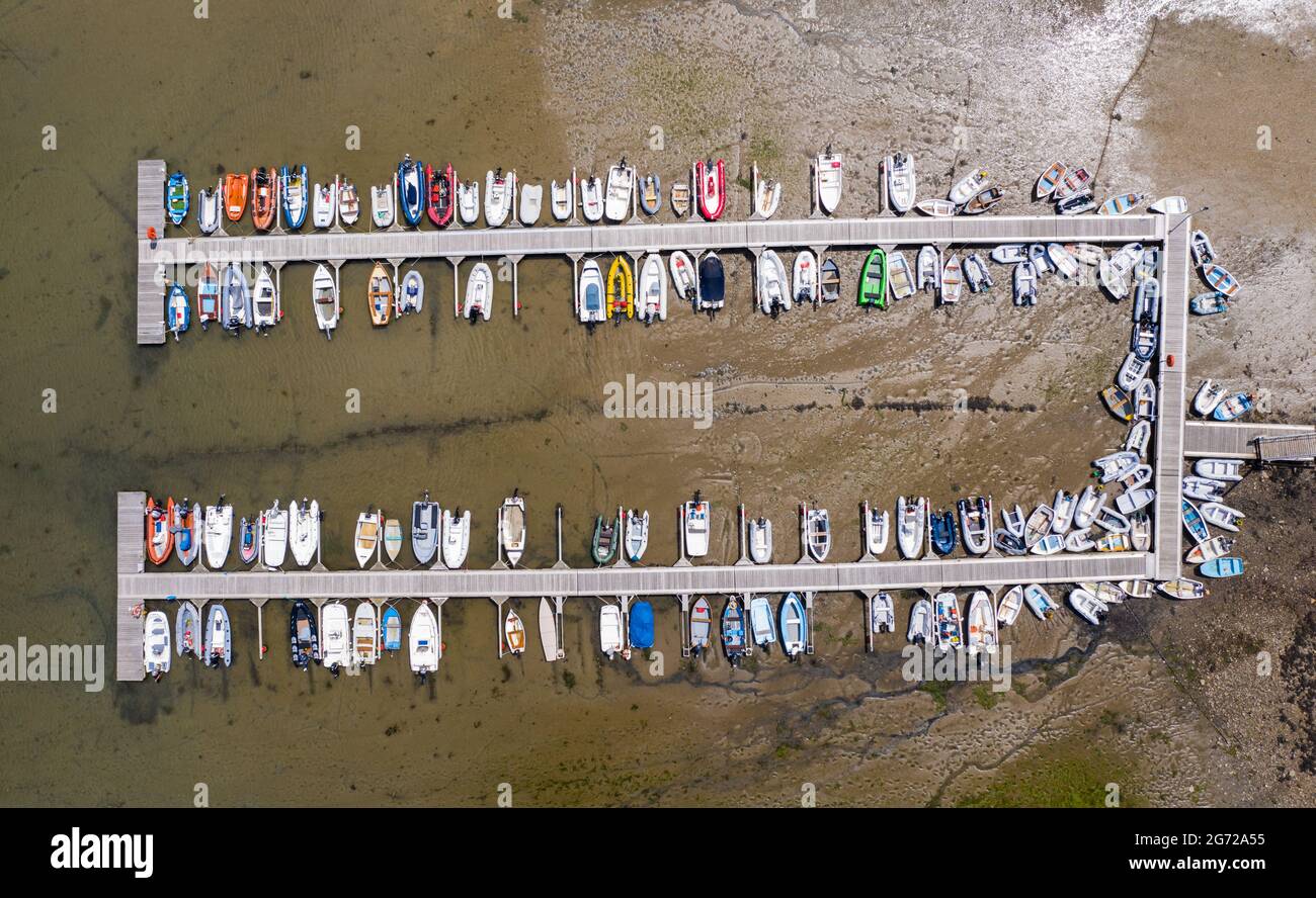 Aerial view of a the jetty of a sailing club in Helford, Cornwall full ...