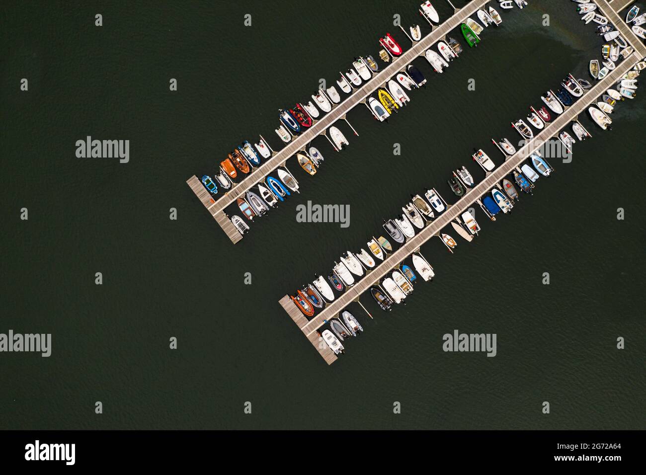 Aerial view of a the jetty of a sailing club in Helford, Cornwall full ...