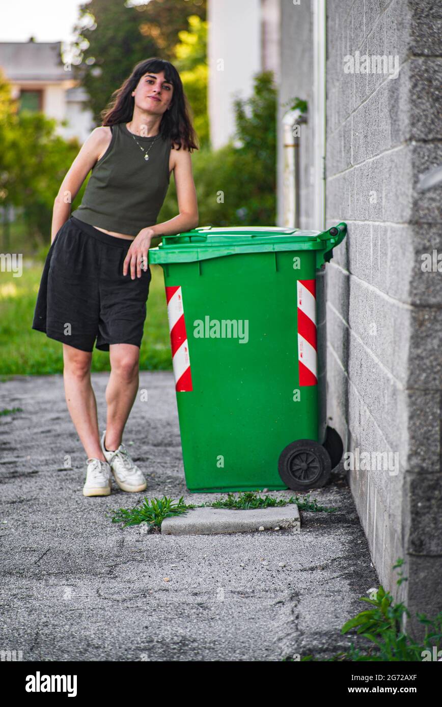 Girl with cartoon dustbin hi-res stock photography and images - Alamy