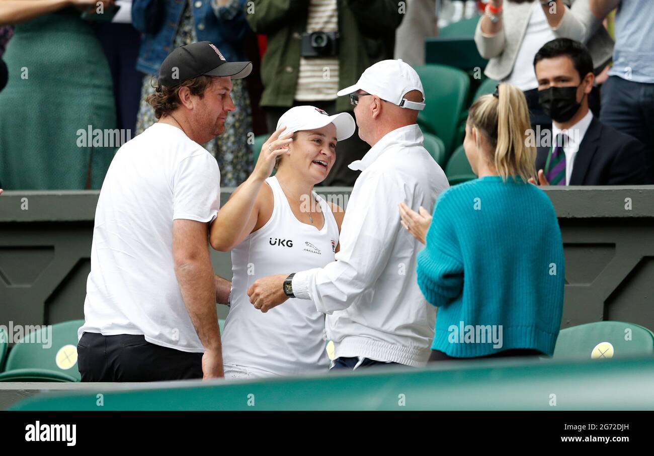 Ashleigh Barty celebrates with boyfriend Garry Kissick (left) and her ...