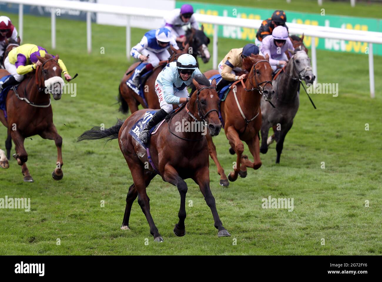 Starman ridden by jockey Tom Marquand on their way to winning the ...