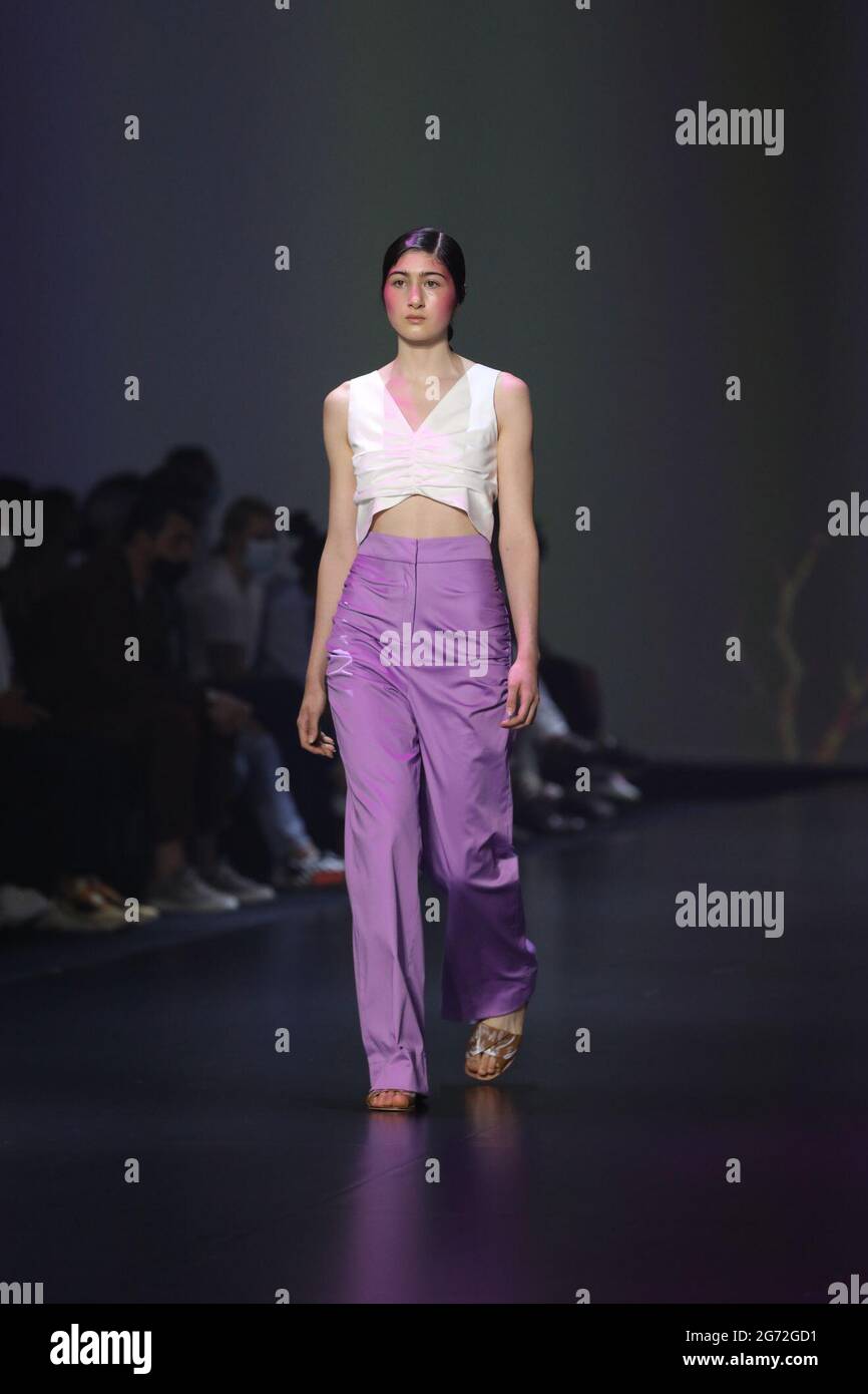 Model walks the runway at CineCittà Studios in Rome, Italy during the ...