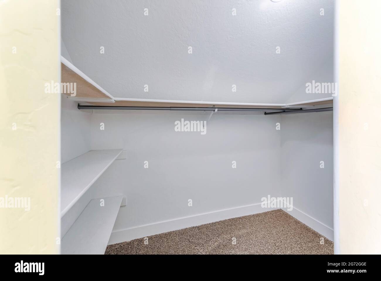 Empty wardrobe room with shelves Stock Photo - Alamy