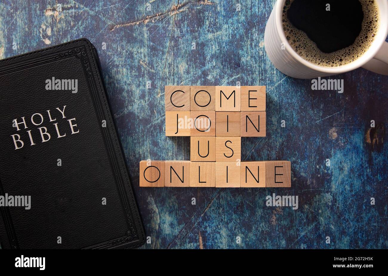 Come Join Us Written in Block Letters on a Blue Wood Table with a Black ...