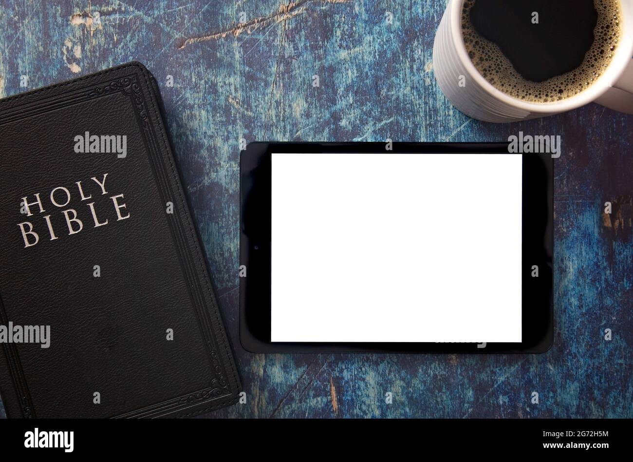 Holy Bible with a Blank Tablet and a Cup of Coffee Stock Photo - Alamy
