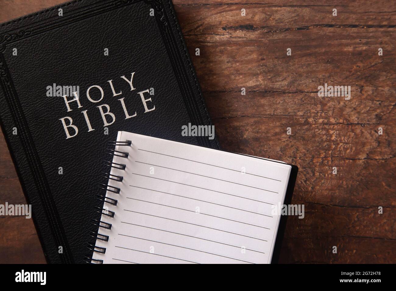 A Bible and White Spiral Notebook for a Bible Study Stock Photo - Alamy