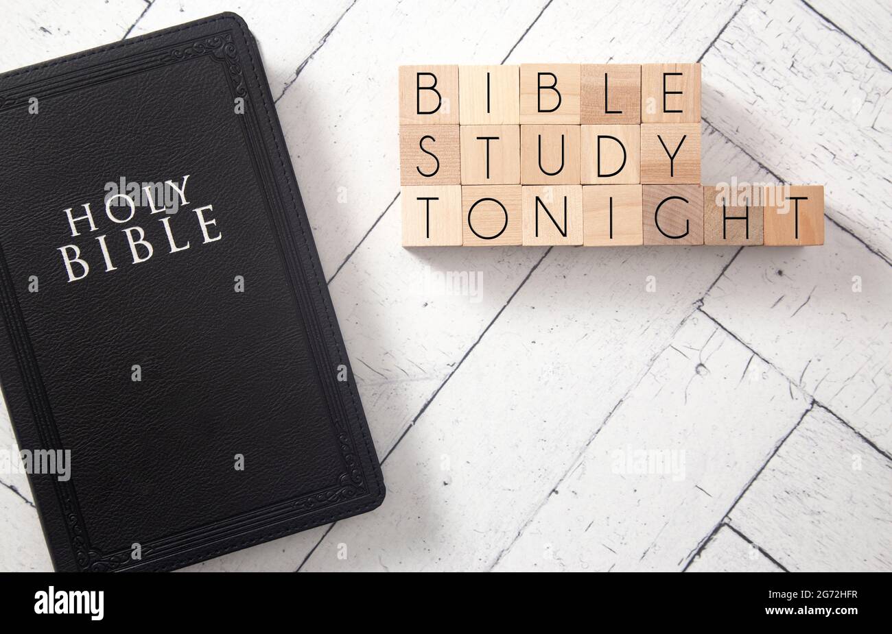Bible Study Tonight in Block Letters on a White Wooden Table with a ...