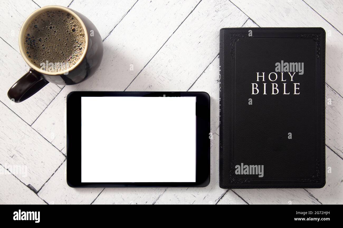 Black Holy Bible with a Blank Tablet ready to Add Your Text Stock Photo ...