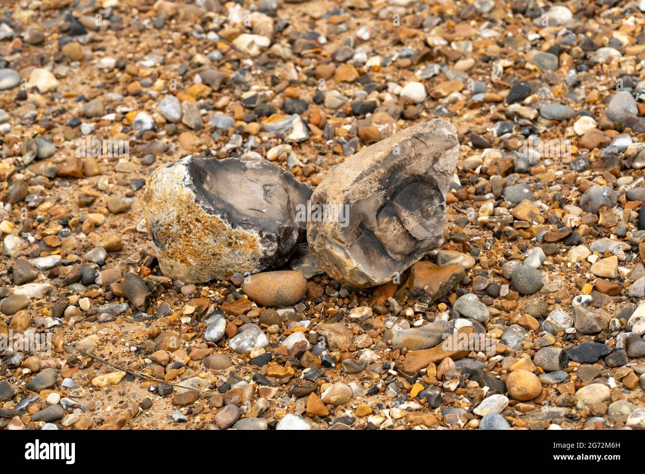 Big flint stone broken in half Stock Photo - Alamy