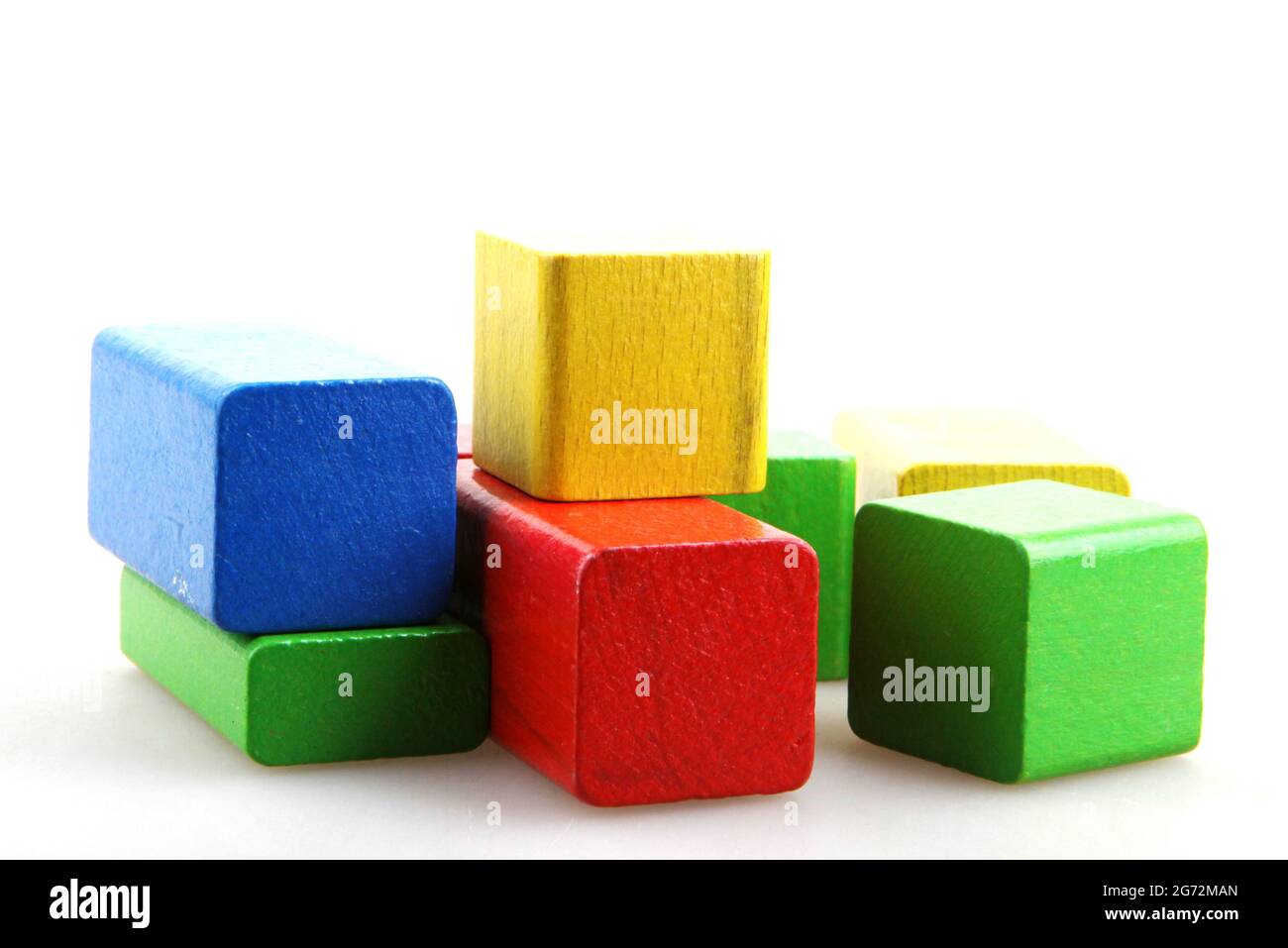 Closeup of wooden toy blocks isolated on white background Stock Photo ...