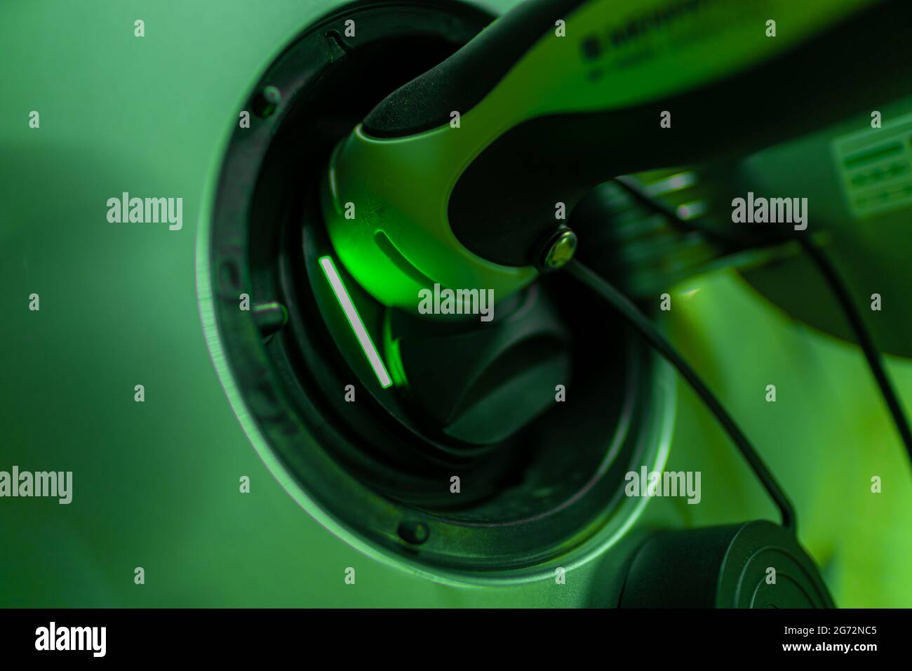 Charging a electric car - the green light shows the active recharge ...